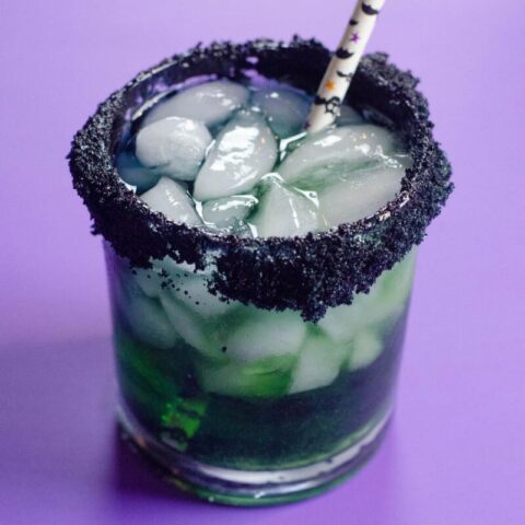Freaky Frankenstein Cocktail with Apple Vodka & Black Sugar Rim