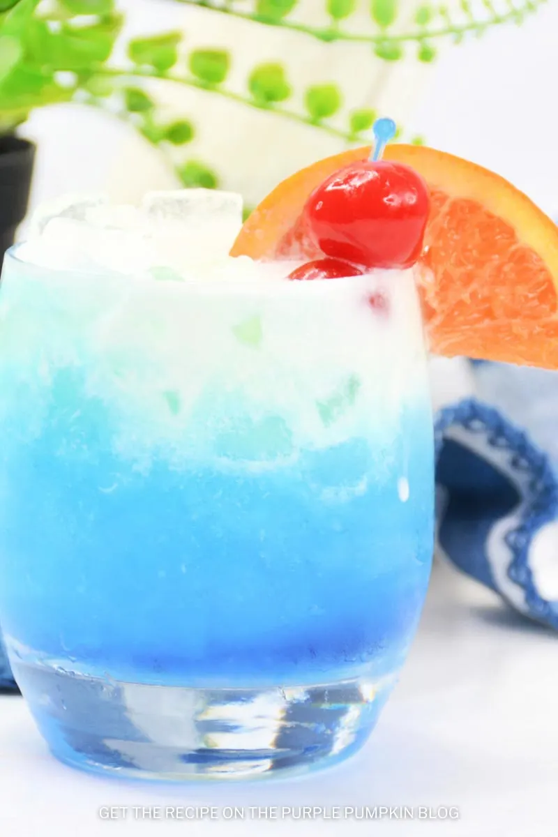 Surf's Up! Tropical Vodka Cocktail With Coconut Cream On Top!